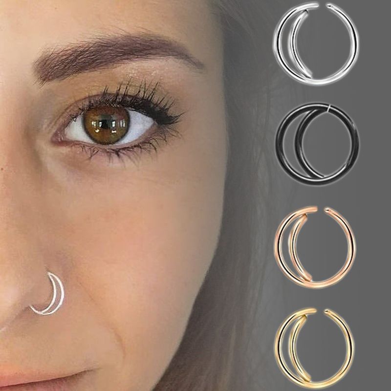 Double Nose And Septum Piercing