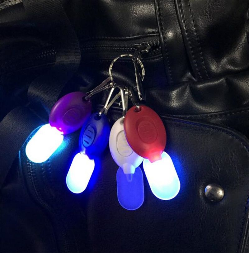 MINI ZIPPER LIGHT Mini Gadget Flashing LED Spot Light Zipper Pendant ...