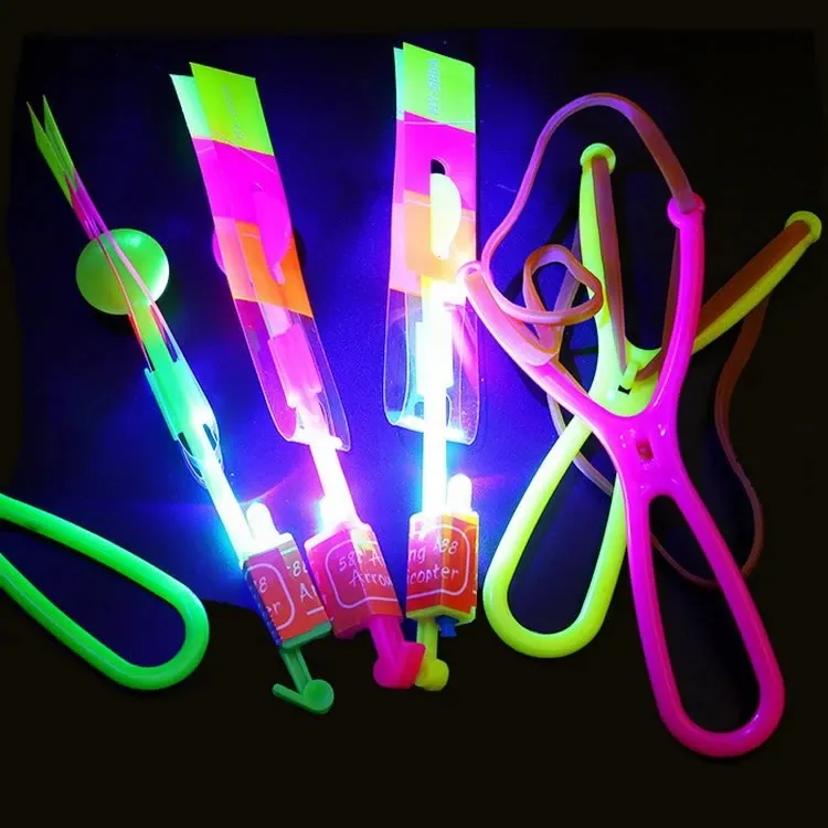 LED Flying Flashing Toys Arrow Helicópteros LED Light Slingshot Arrows ...