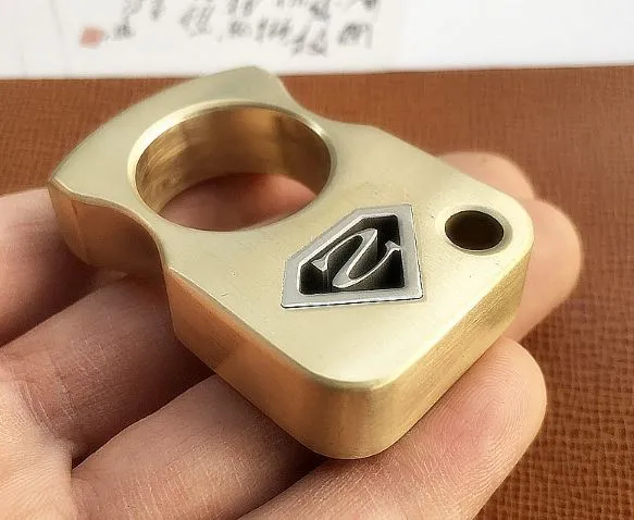 DHgate.com:New brass knuckles duster EDC defense ring finger buckle ...