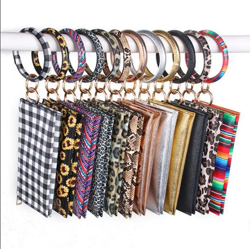 DHgate.com:Stylish PU Leather Bangle Keychain Wristlet Purse for Women ...