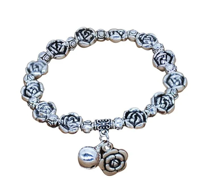 Handmade Flower Bracelet: Ethnic Rope Style Bracelet with Bell Accent ...