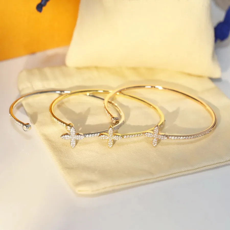 DHgate.com:Elegant V-Initial Titanium Steel Bangle Bracelet with Full ...