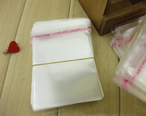 DHgate.com:11x23cm Clear Self Adhesive Seal OPP Bag, Transparent Bra ...