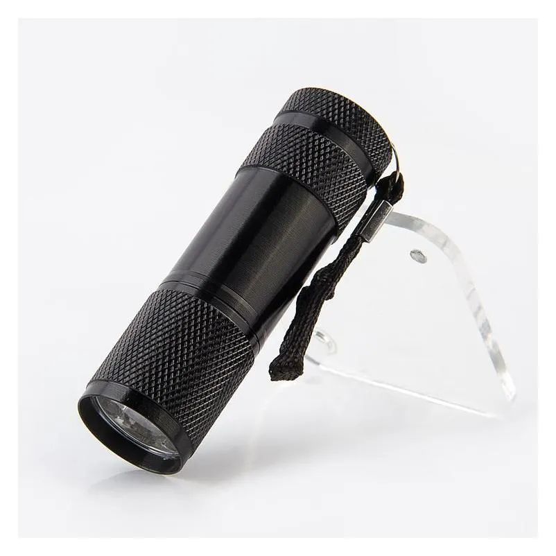 DHgate.com:Ultra Bright 9 LED Flashlight UV Tra Violet Mini Portable ...