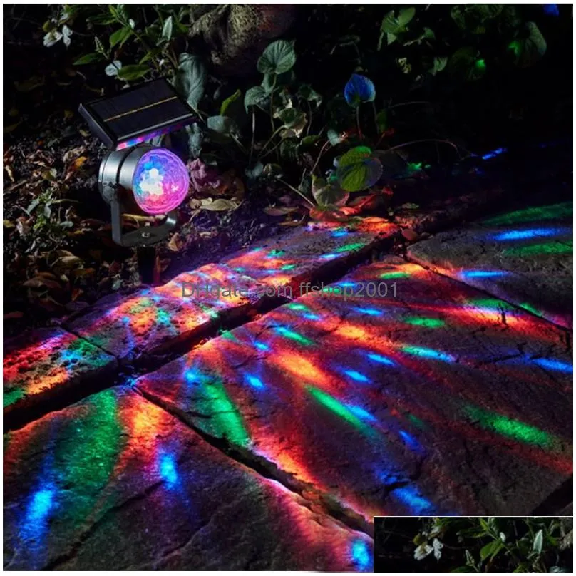 DHgate.com:Colorful Solar Rotating Projection Lamp, Waterproof Outdoor ...