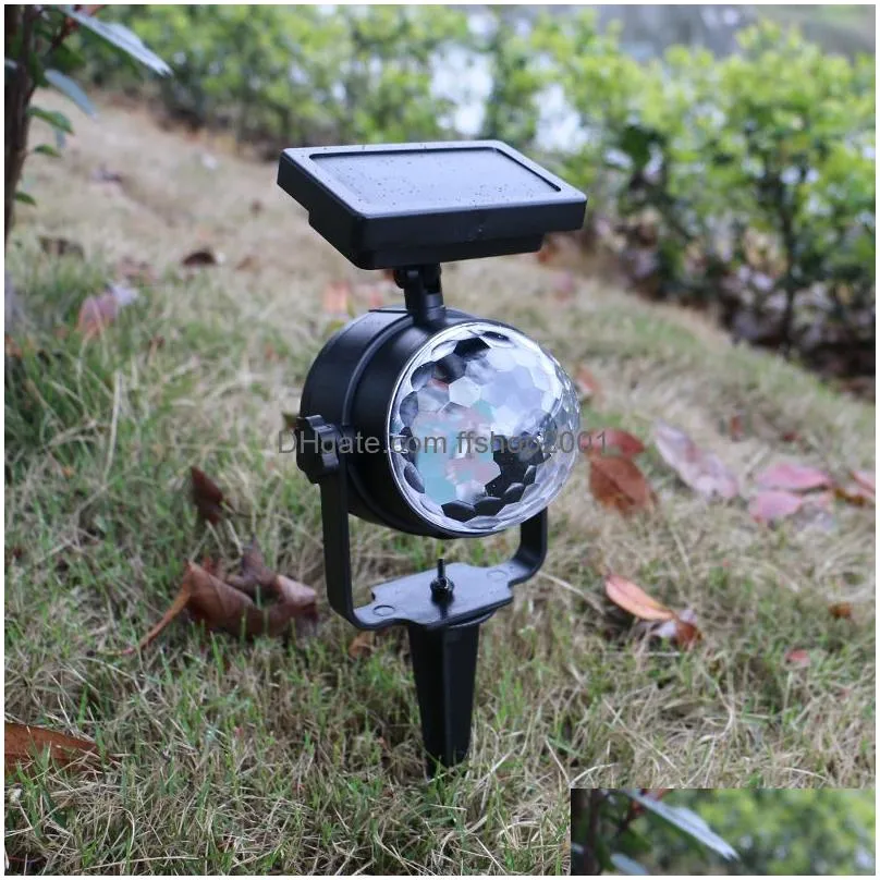 DHgate.com:Colorful Solar Rotating Projection Lamp, Waterproof Outdoor ...