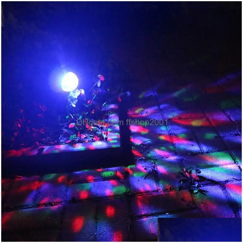 DHgate.com:Colorful Solar Rotating Projection Lamp, Waterproof Outdoor ...